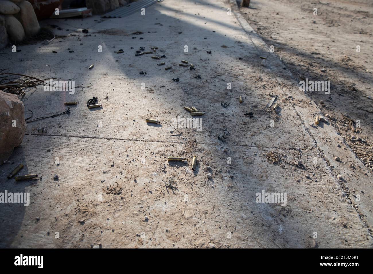 Shot cartridges from automatic weapons are still lying on the ground ...