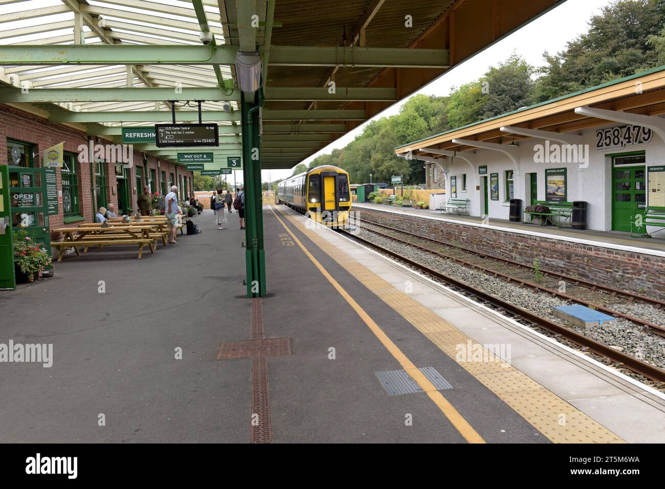 Passengers with a GWR Great Western Railway DMU train at the restored ...