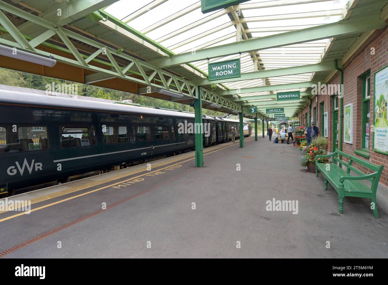 Passengers and a GWR Great Western Railway DMU train at the restored ...