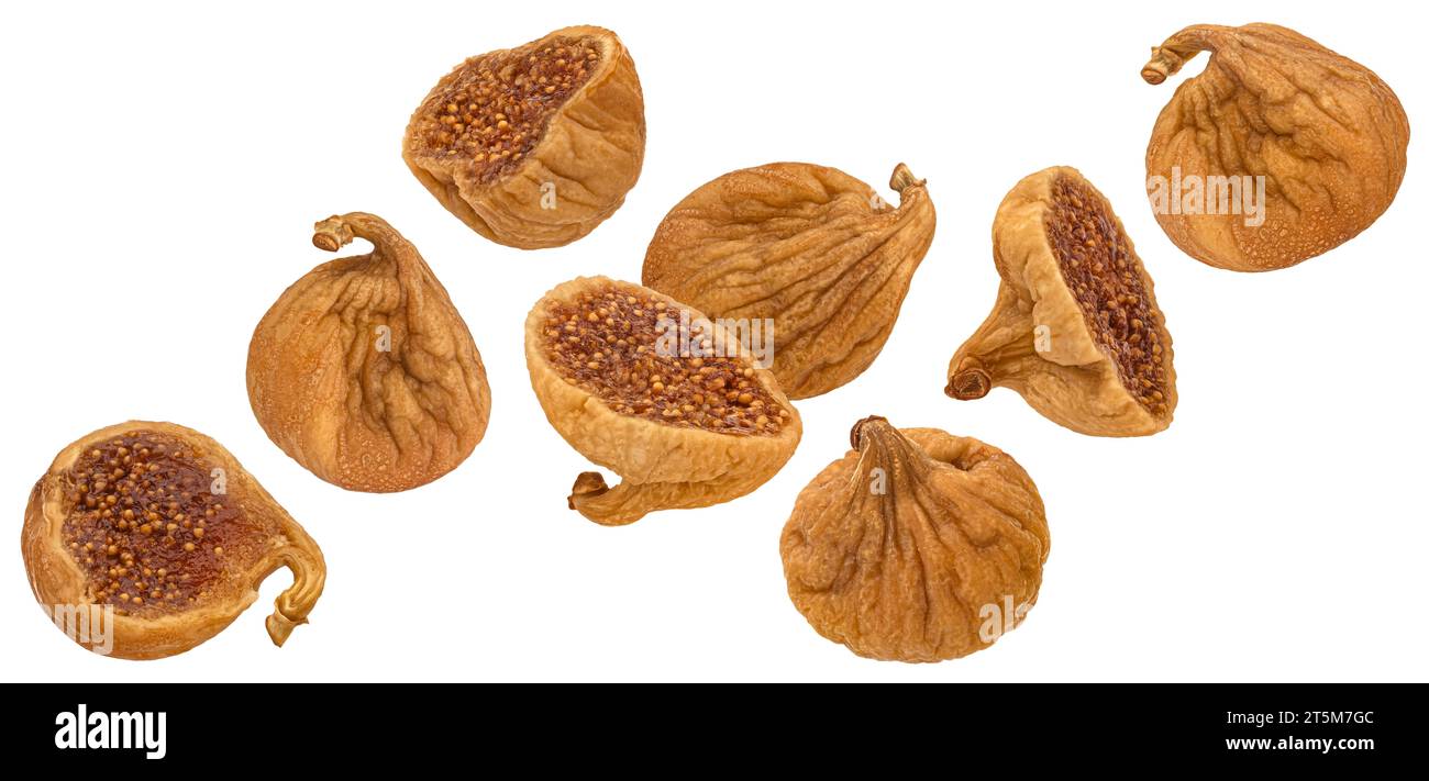 Falling dry figs isolated on white background Stock Photo - Alamy
