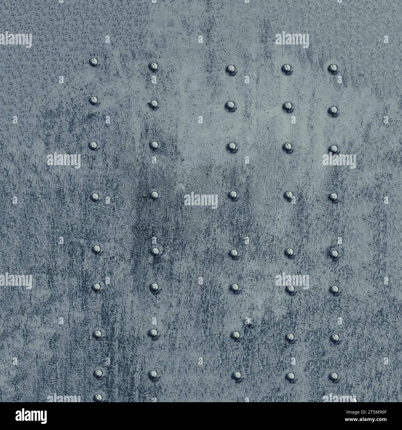 Riveted metal surface, painted grey Stock Photo - Alamy