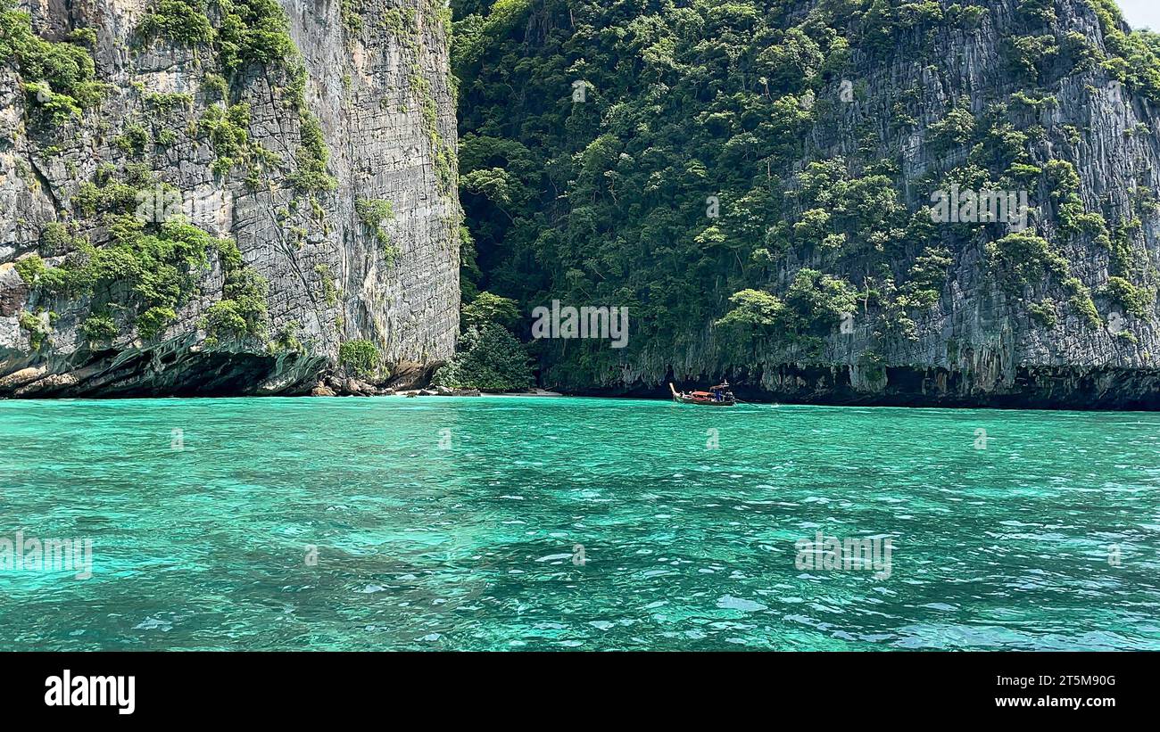 Wave, sand beach, and beautiful crystal clear water at Maya Bay in Phi ...