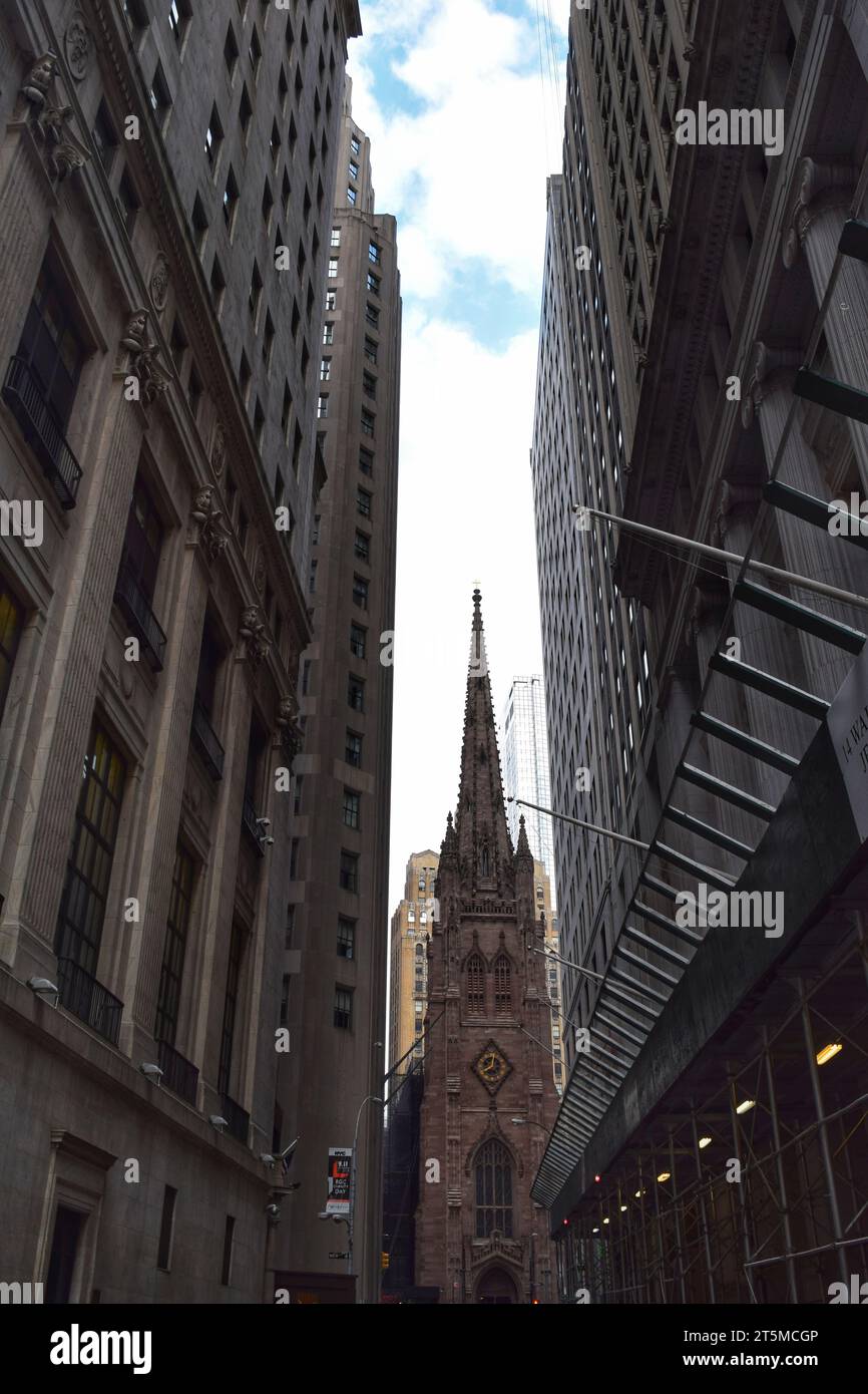 An iconic old clock building stands tall, surrounded by modern ...