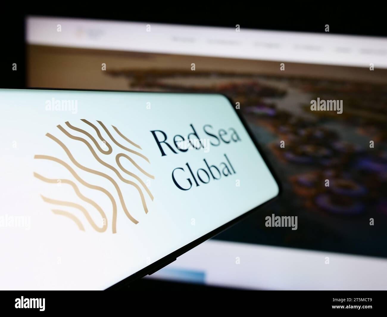 Mobile phone with logo of Saudi Arabian development company Red Sea ...