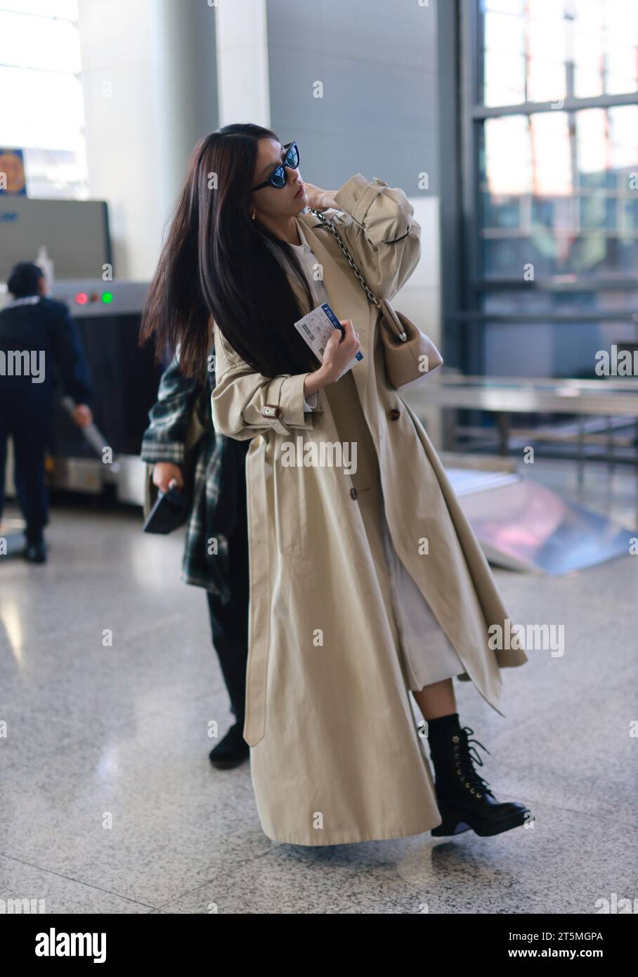 Hong Kong actress and fashion model Janice Man appears at the airport ...