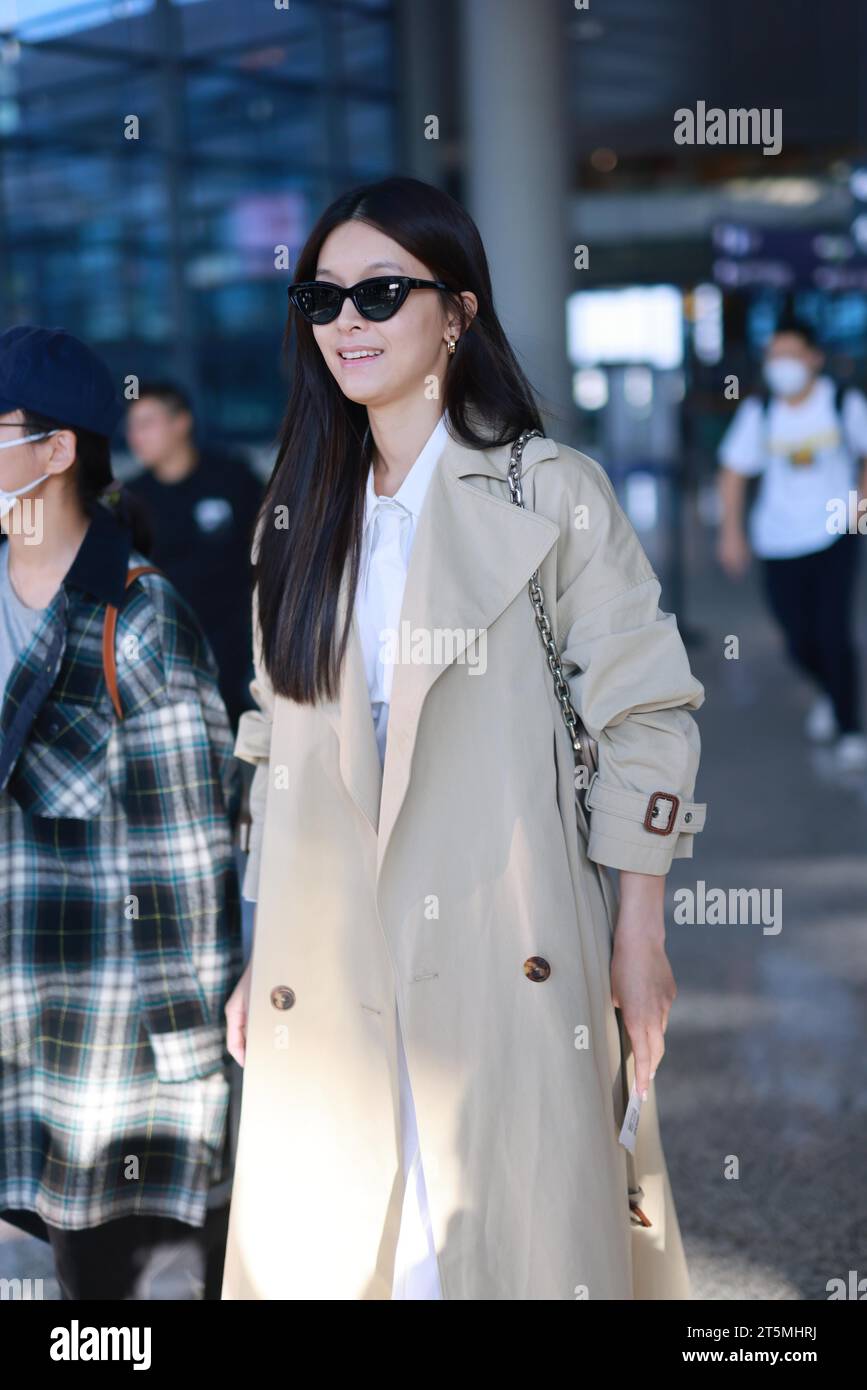 Hong Kong actress and fashion model Janice Man appears at the airport ...