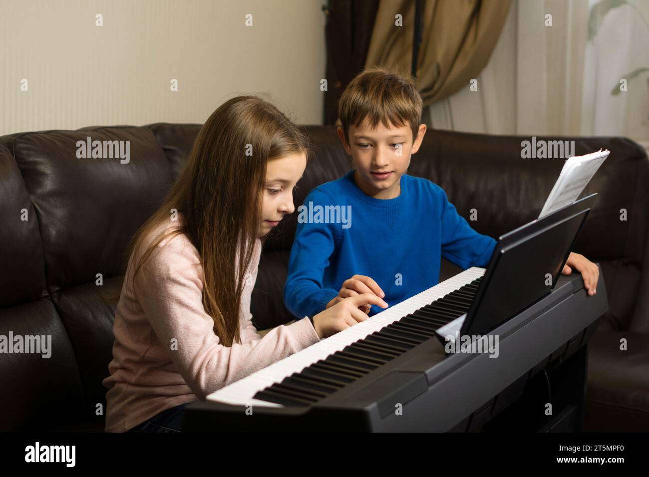 Beginner pianist hi-res stock photography and images - Alamy