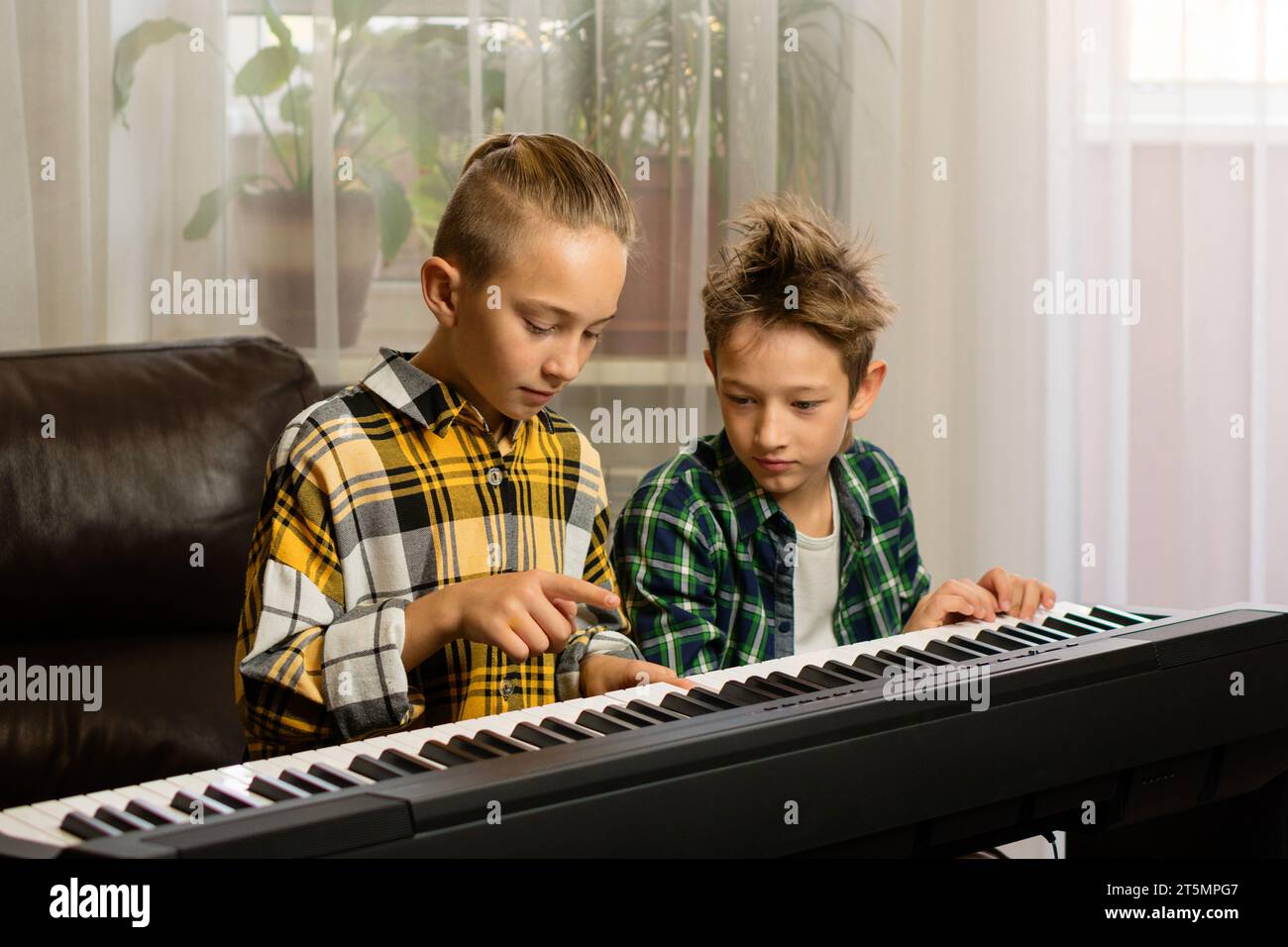 Older younger brothers hi-res stock photography and images - Alamy