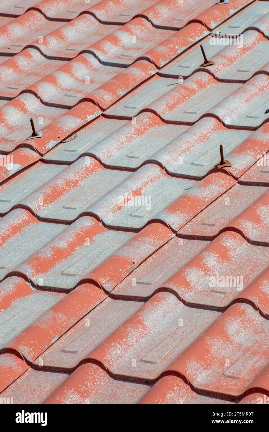 close-up of terracotta pantiles on the roof of an old greek building ...