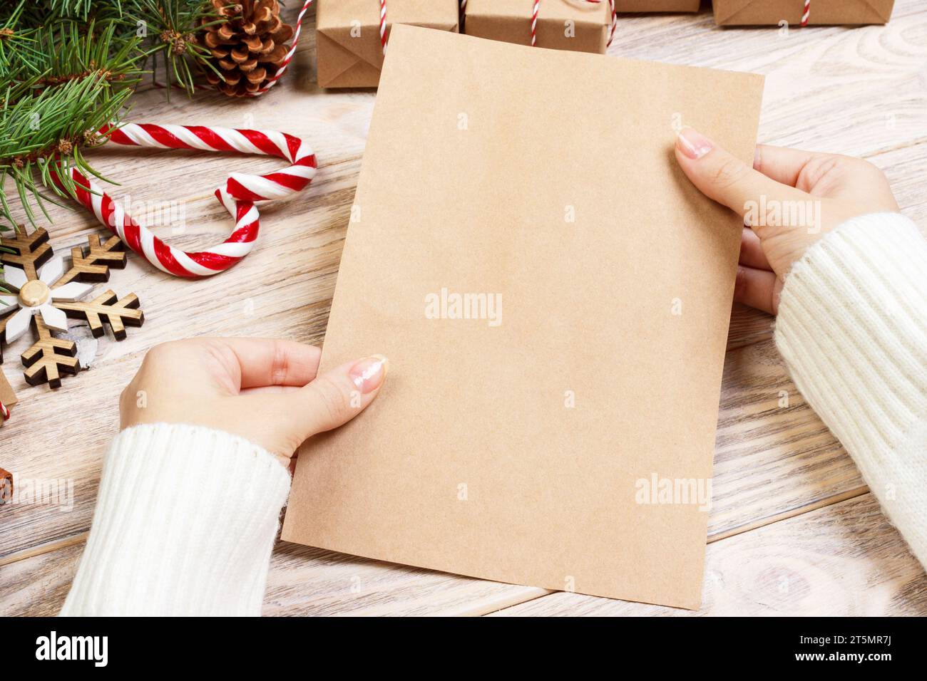 Child write letters and holds them in hands. Mock-up letter format A4 ...