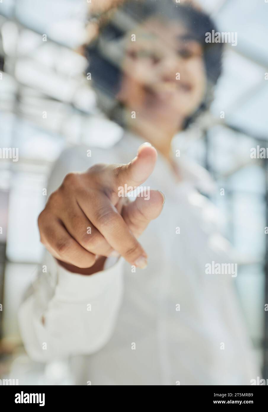 business woman looks admiringly into the distance through the glass ...