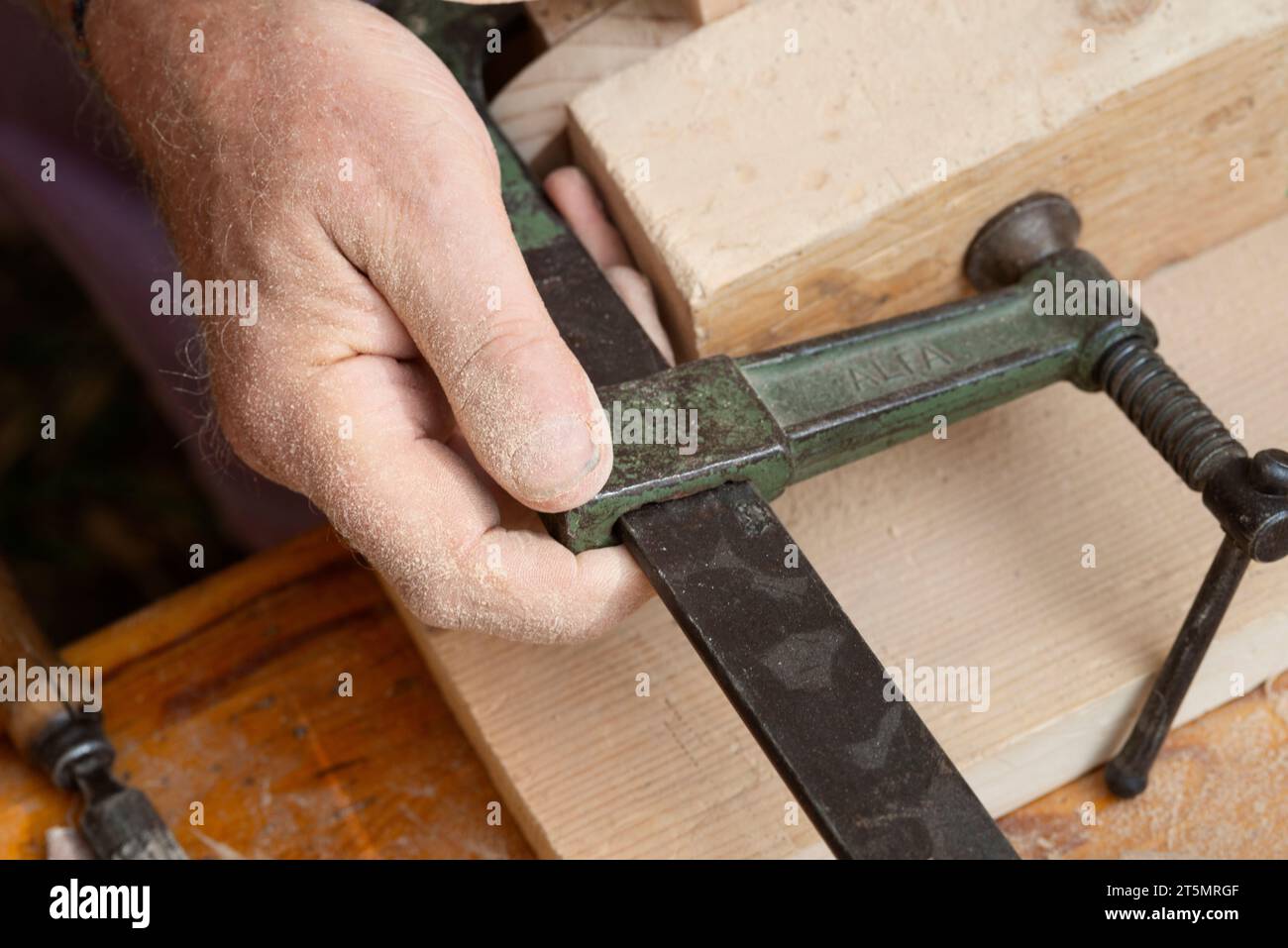 Male carpenter clamps board hi-res stock photography and images - Alamy