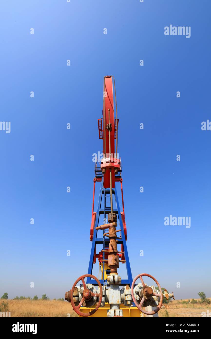 Beam crank balanced pumping unit Stock Photo - Alamy