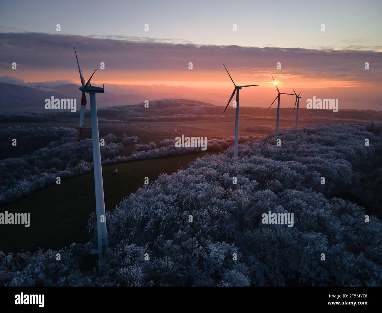 Aerial landscape photography of sunrise over frost-covered nature with ...