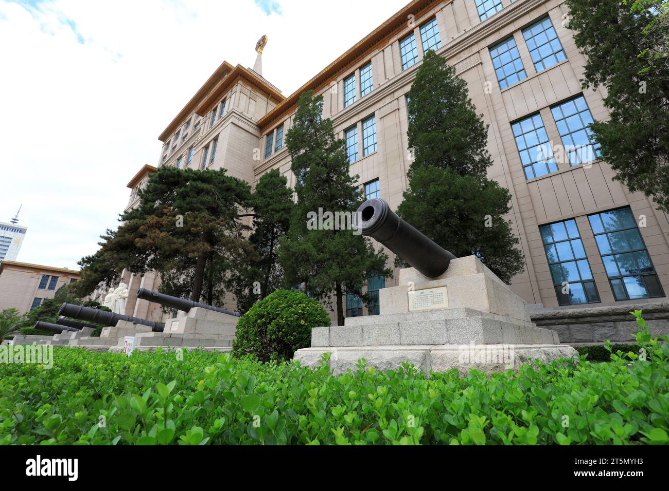 Beijing - June 28, 2019: The iron gun was mounted on a rock base ...