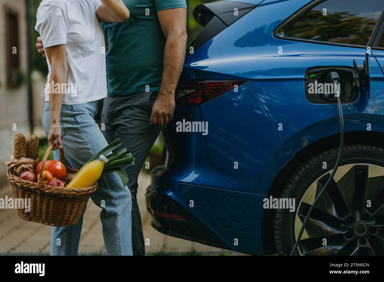 Loading groceries electric car hi-res stock photography and images - Alamy
