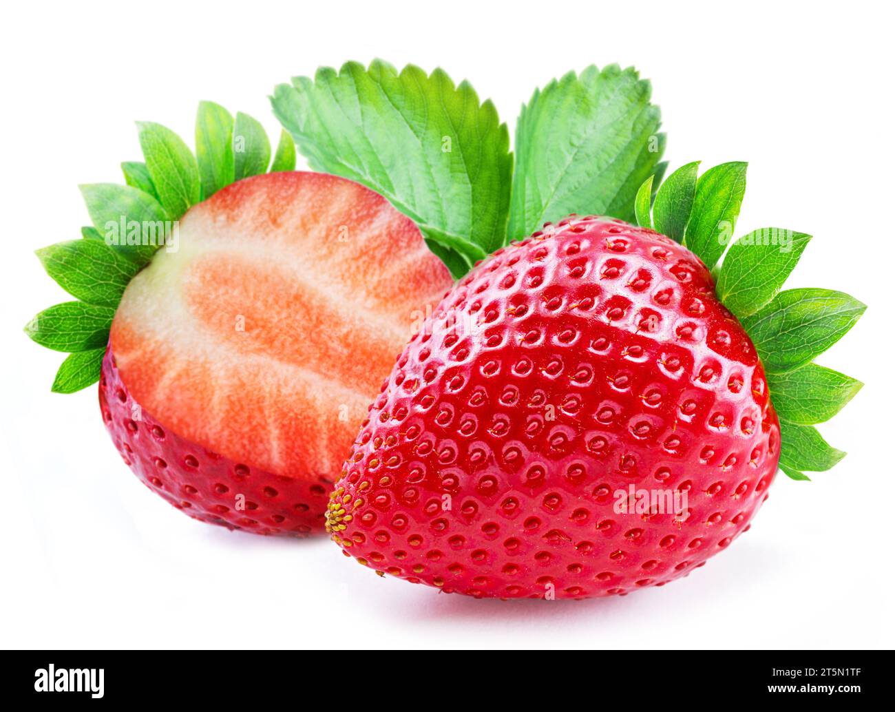 Ripe perfect strawberry and cross cut of strawberry with leaf isolated ...