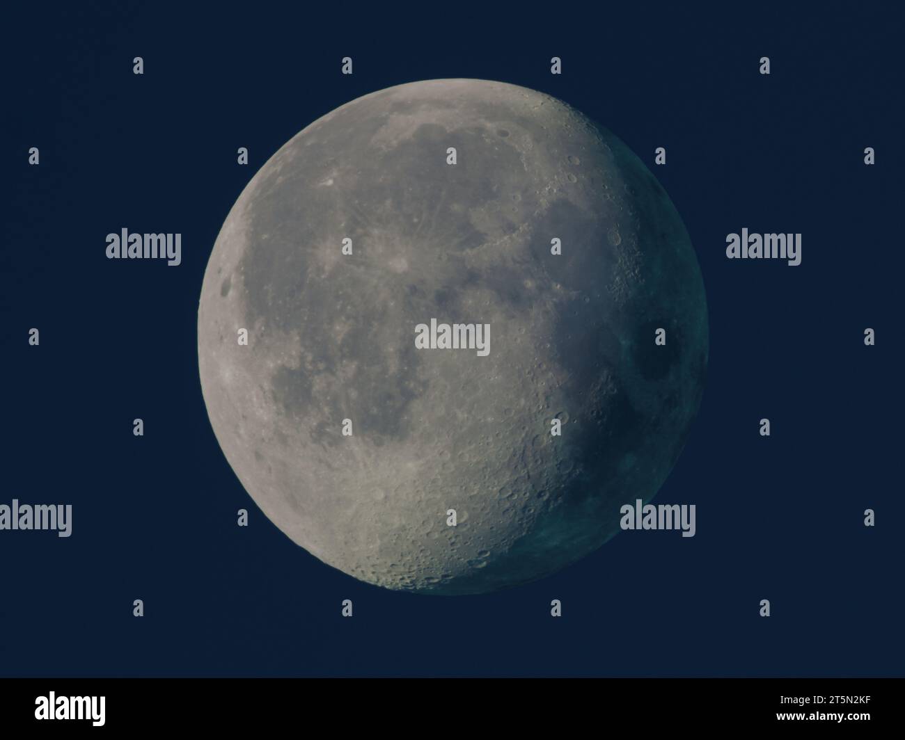 Photograph of Moon in the waning gibbous lunar phase Stock Photo - Alamy