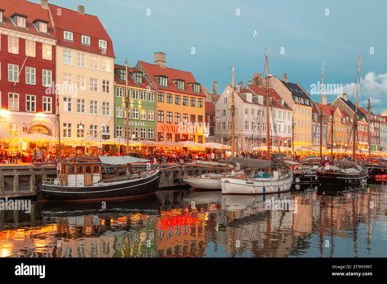 General view of the main street of Nyhavn neighborhood in Copenhagen ...