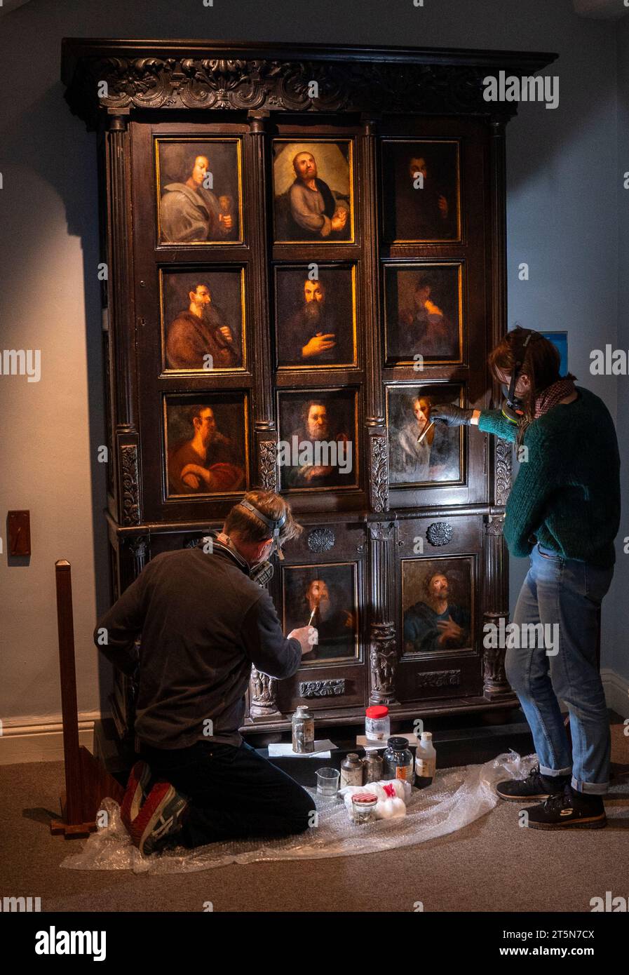 Conservators David Everingham and Alison Aynesworth work to restore 12 ...