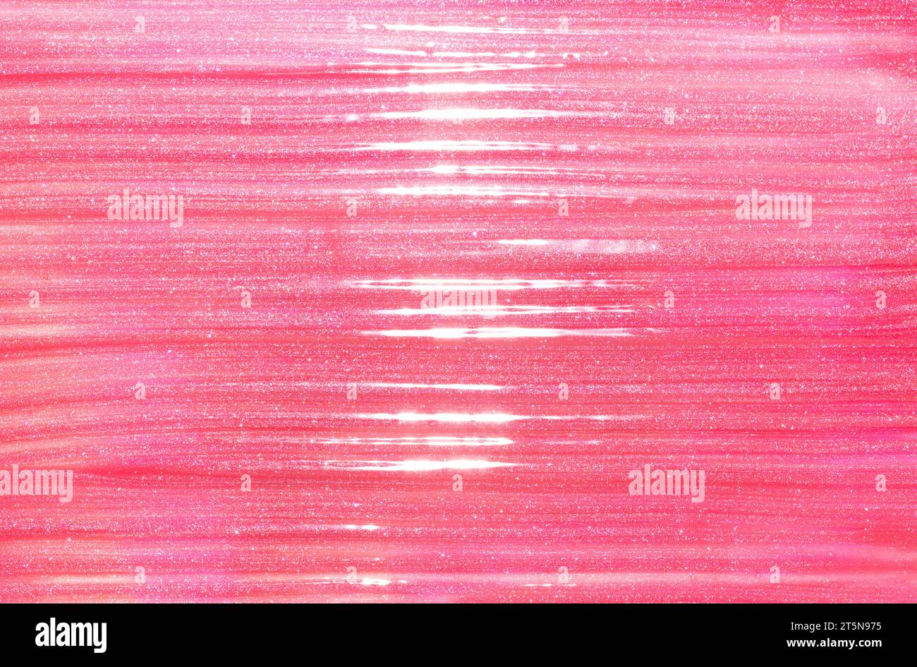 Pink shimmering lip gloss texture background with highlights. Smudged ...