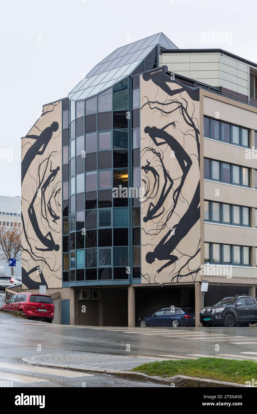 Malstrøm mural graffiti artwork with silhouettes of people and tree ...