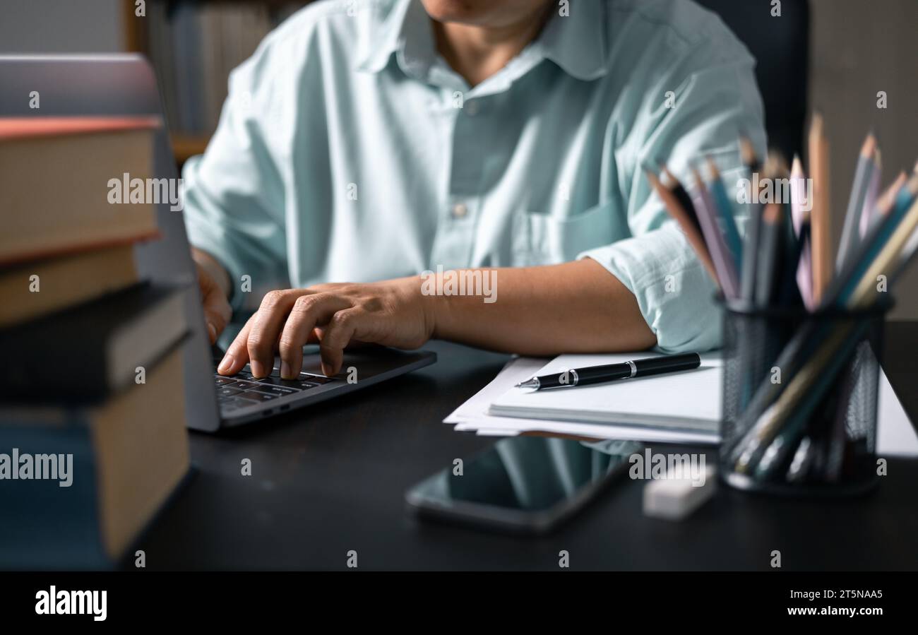 Education concept. Close up of female student make notes hand typing in ...
