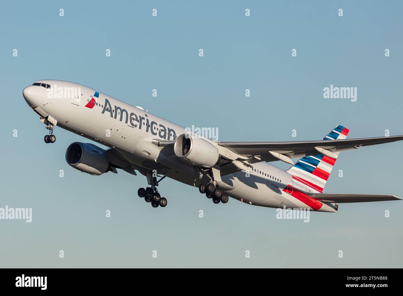An American Airlines Boeing 777-323ER climbing out of London Heathrow ...