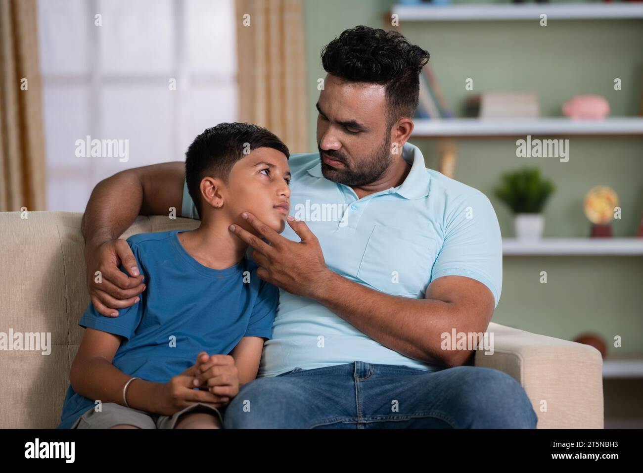 Sad indian father hi-res stock photography and images - Alamy