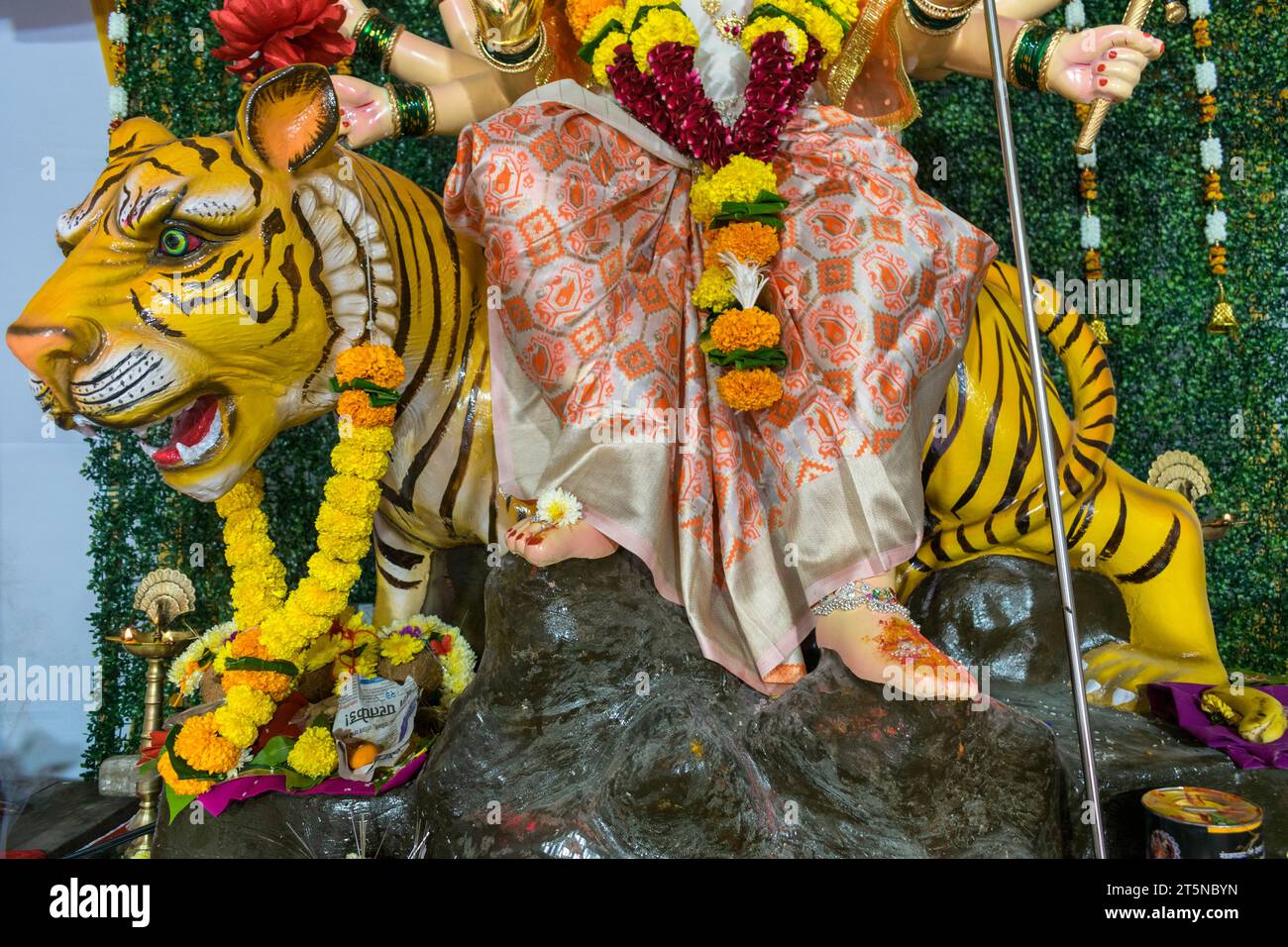 A beautiful idol of Maa Durga being worshipped at a pandal during ...