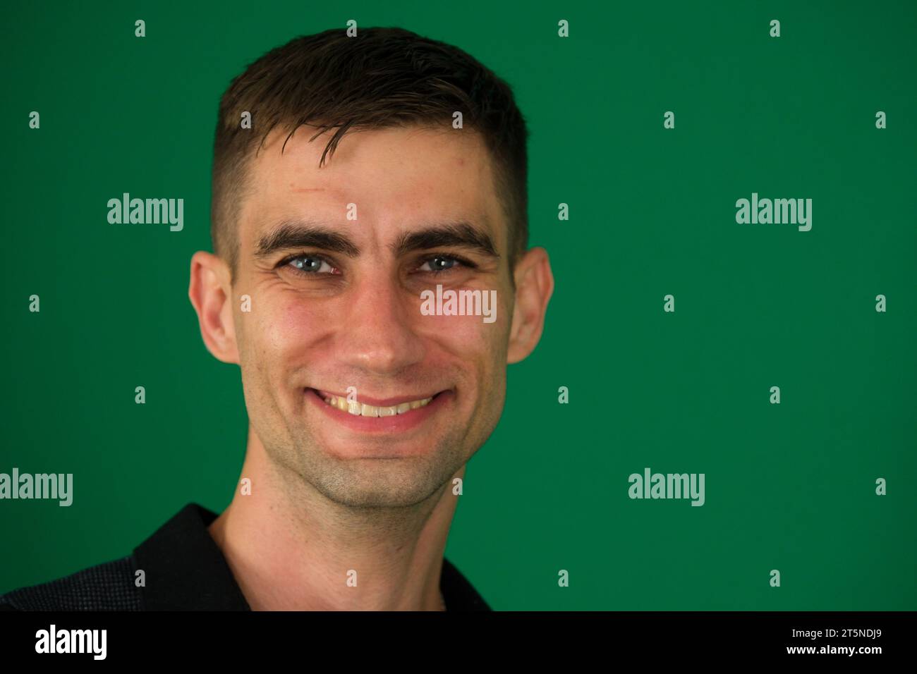 Caucasian young mans close up shot on studio background. Beautiful male ...