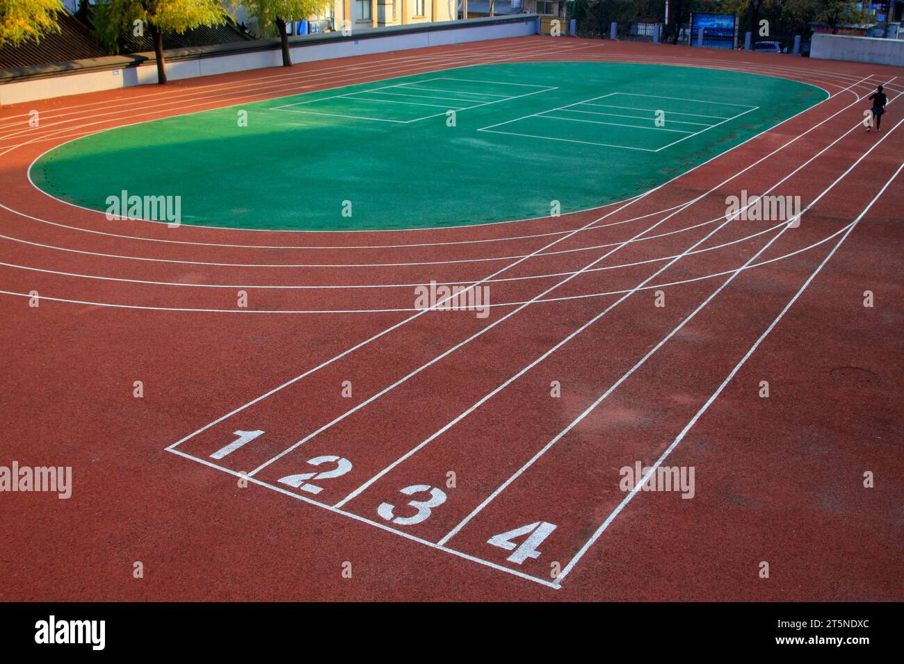 plastic runway in a sports ground in a middle school Stock Photo - Alamy