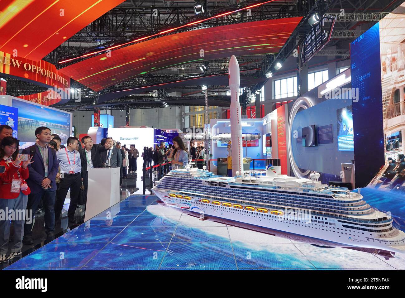 SHANGHAI, CHINA - NOVEMBER 6, 2023 - Visitors look at the model of ...