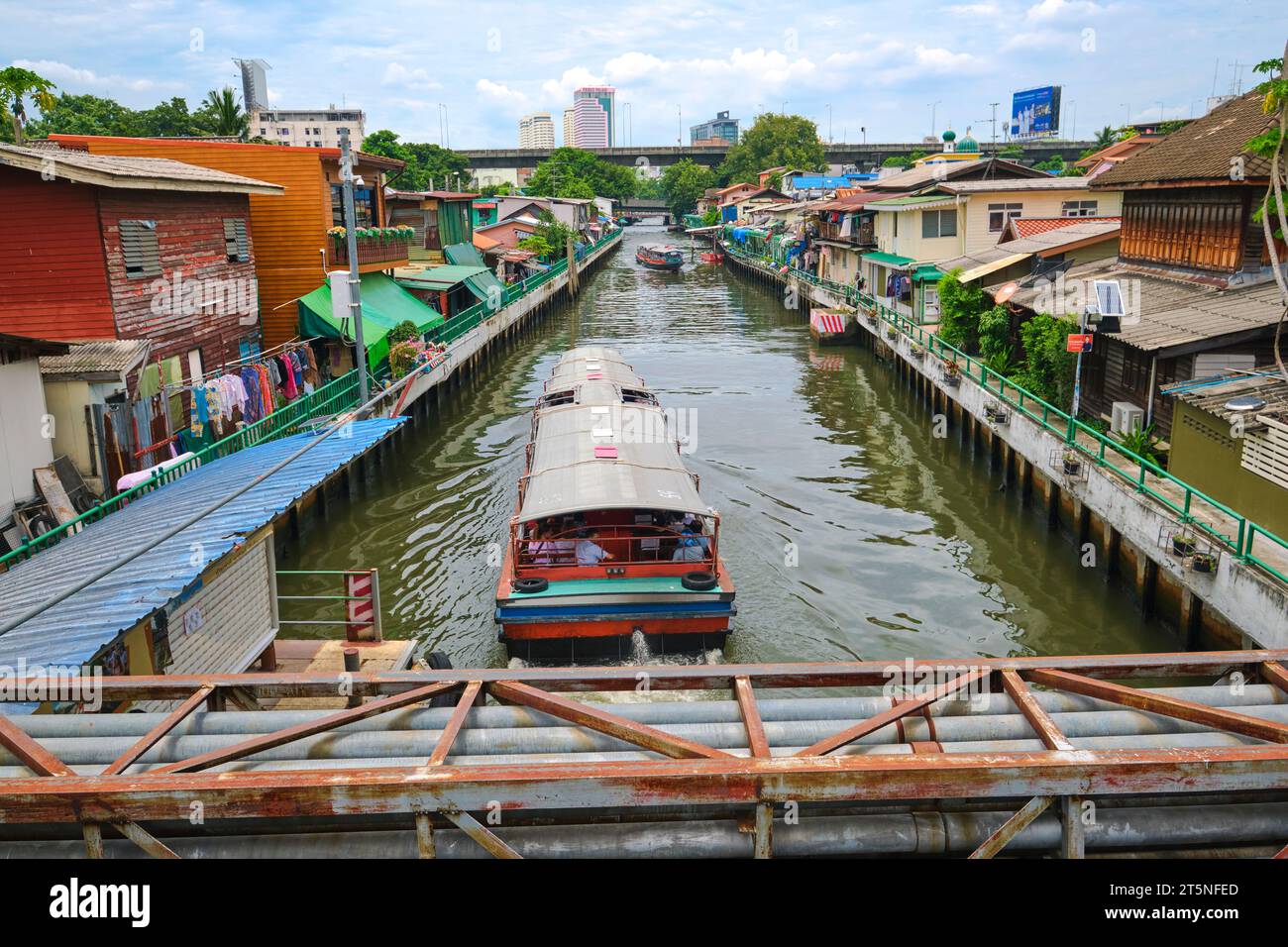 Communter passenger ferry boats on a local canal, carrying people ...