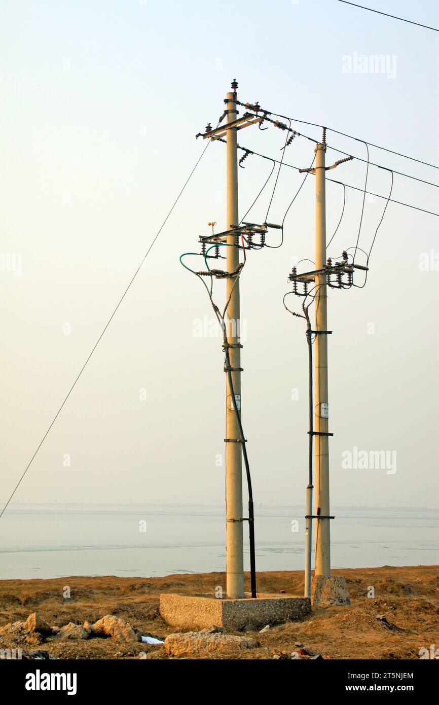 telegraph poles in the desert, closeup of photo Stock Photo - Alamy