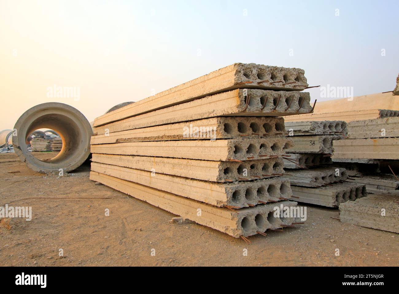 Cement concrete precast slab and pipe, closeup of photo Stock Photo - Alamy