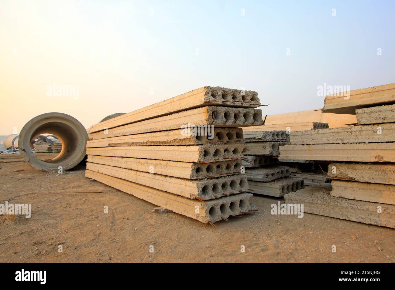 Cement concrete precast slab and pipe, closeup of photo Stock Photo - Alamy