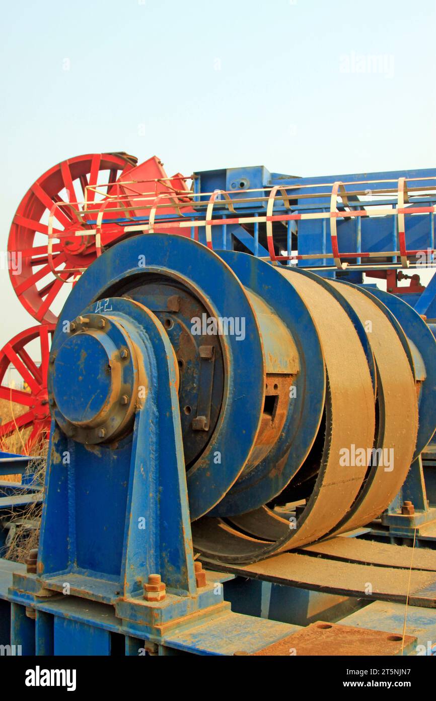 Tower type pumping unit wheel parts, closeup of photo Stock Photo - Alamy