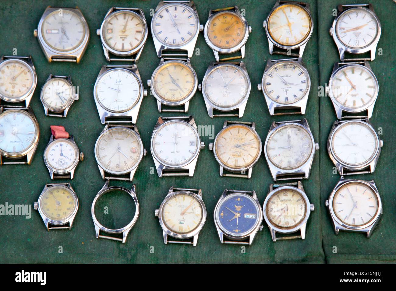 Old watch in the booth, closeup of photo Stock Photo - Alamy