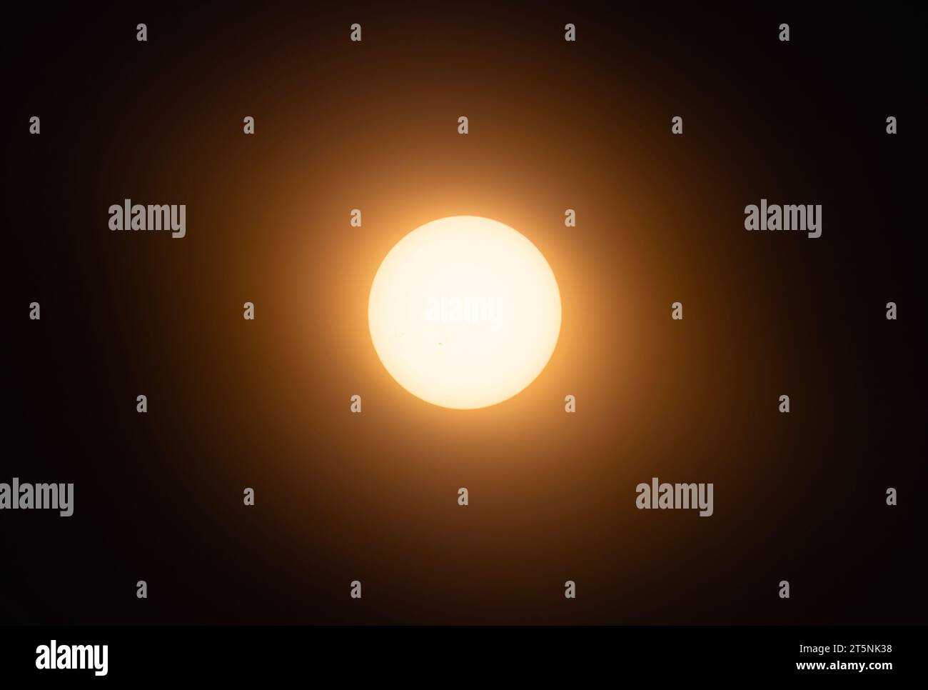 The sun glowing with many sunspots using a homemade solar filter ...