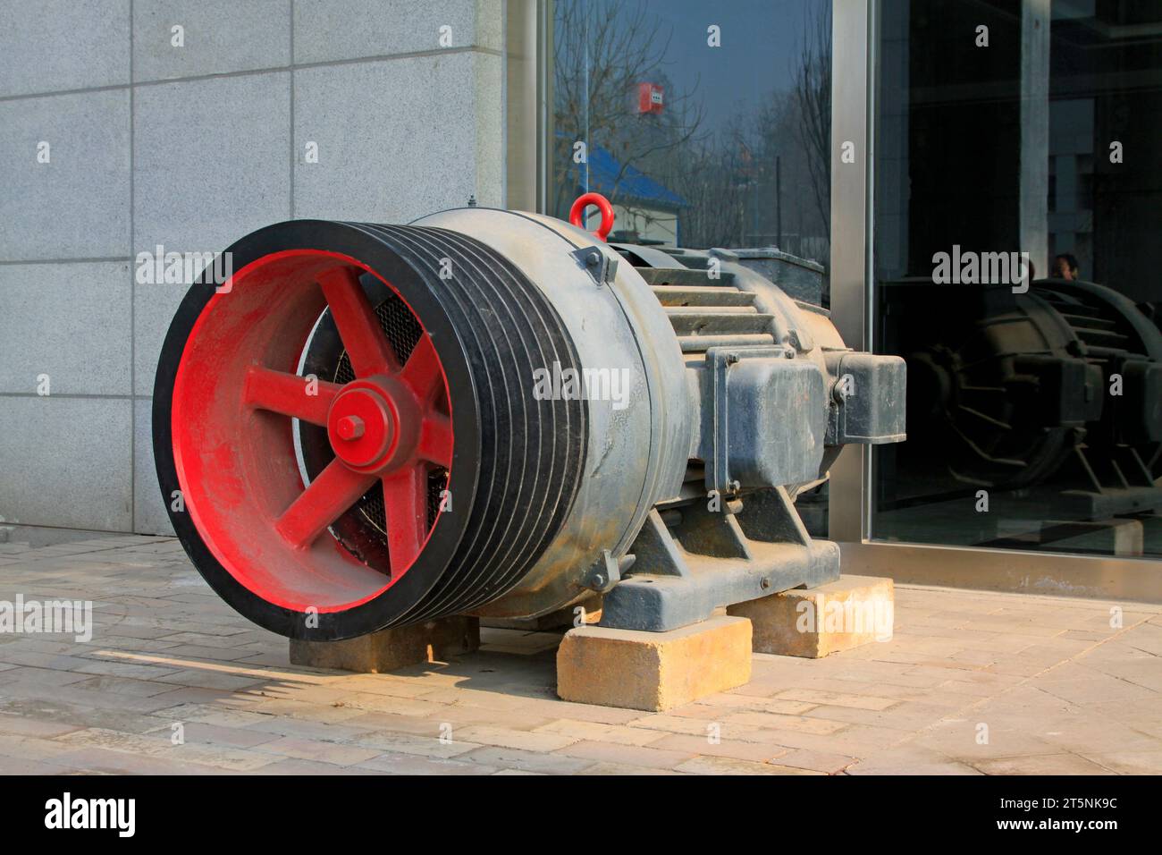 Huge red metal wheels, closeup of photo Stock Photo - Alamy
