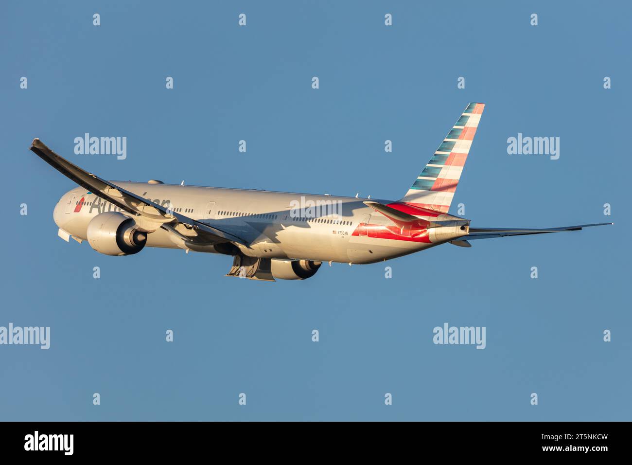 American Airlines Boeing 777-323ER registration N730AN leaving London ...
