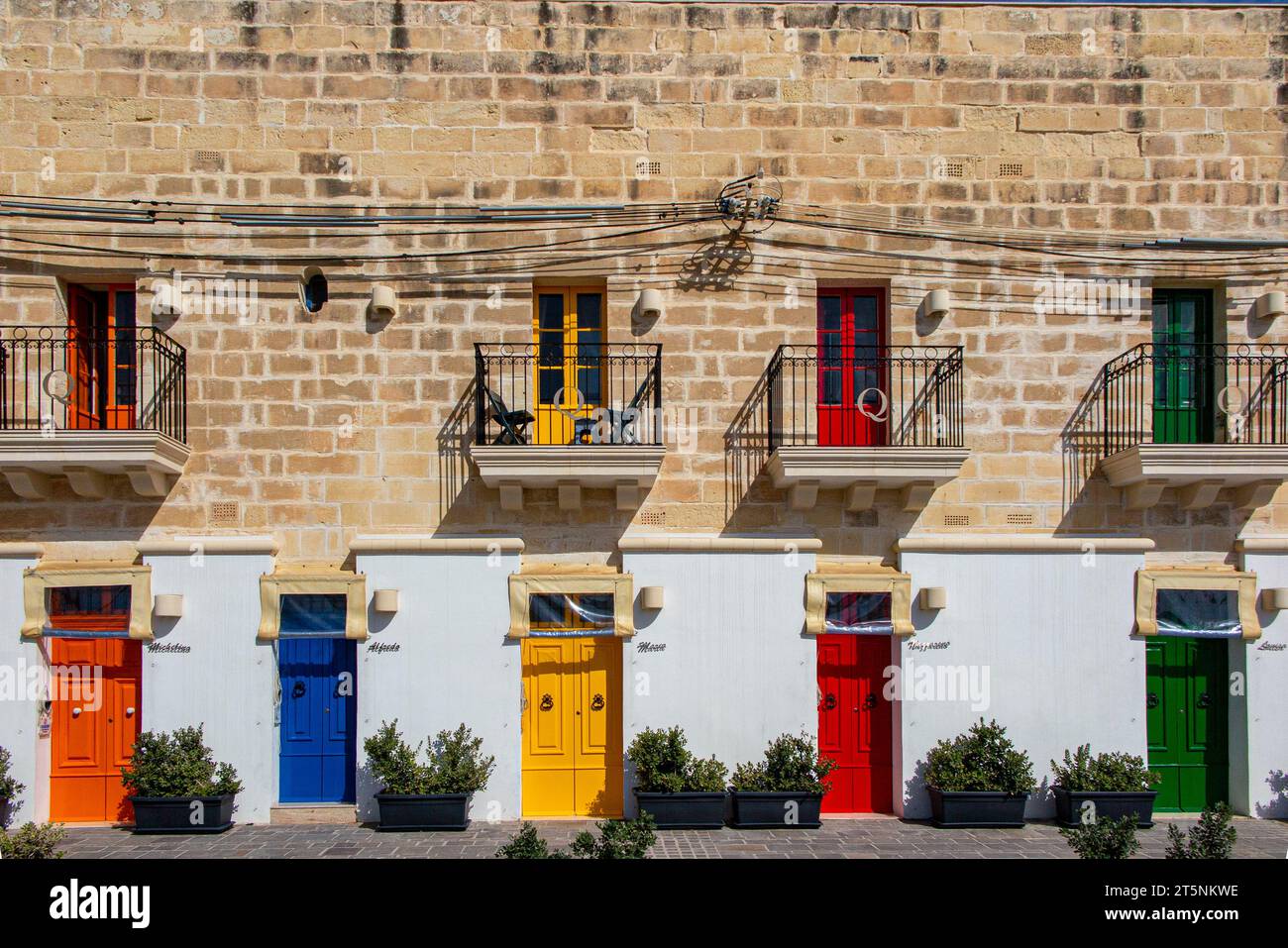 Row of doors hi-res stock photography and images - Alamy