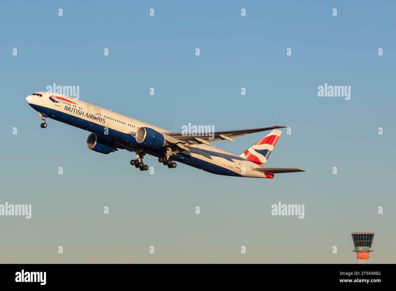 British Airways Boeing 777-336ER registration G-STBF departing London ...