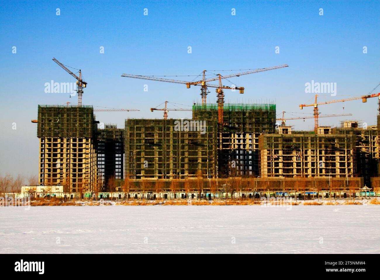 Unfinished buildings in the snow, in northern China Stock Photo - Alamy