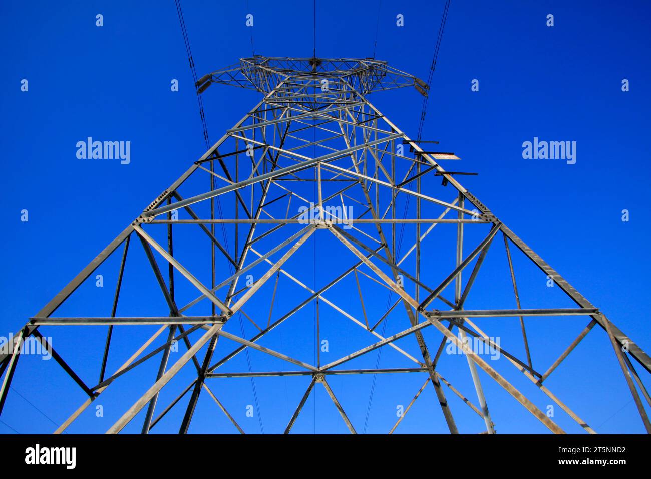 Pylon in the blue sky background, closeup of photo Stock Photo - Alamy