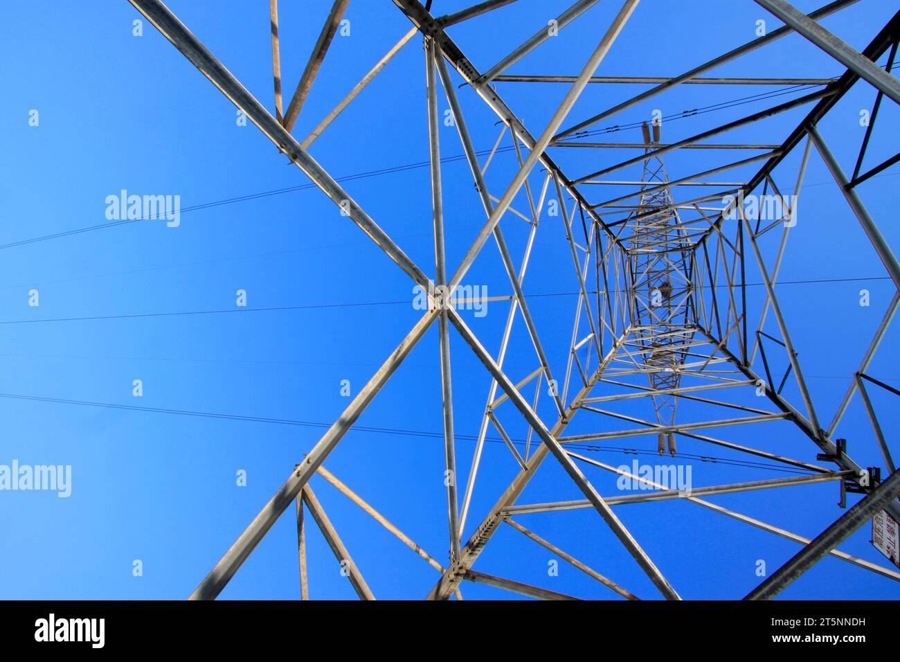 Electric power tower bottom view, closeup of photo Stock Photo - Alamy
