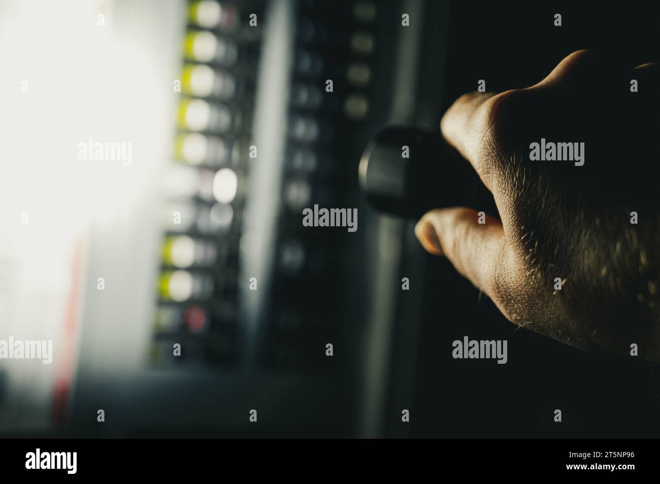 photo during a power outage with silhouette of hand holding a ...