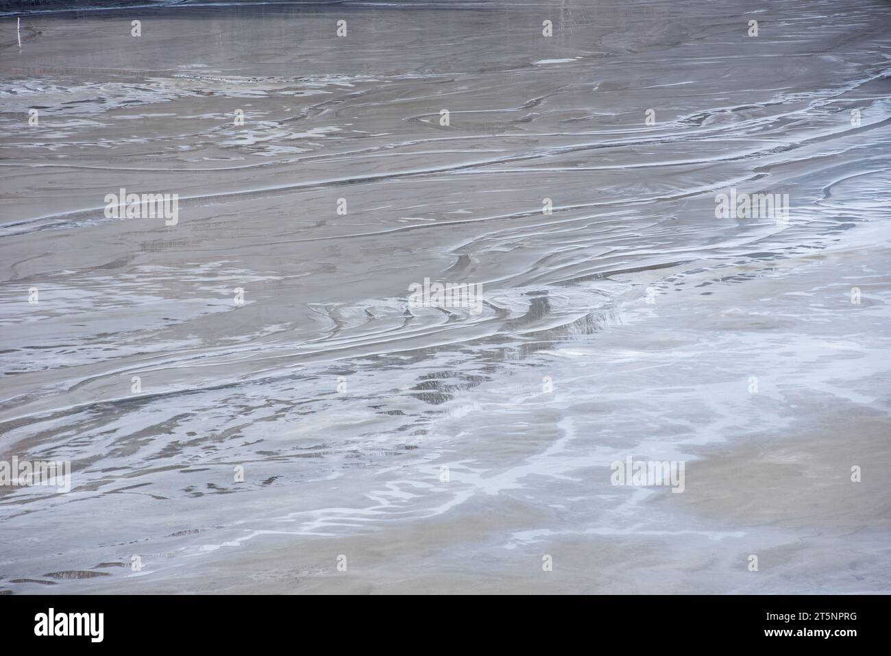 Muddy waters in a decantation pond. Toxic residuals from a copper mine ...