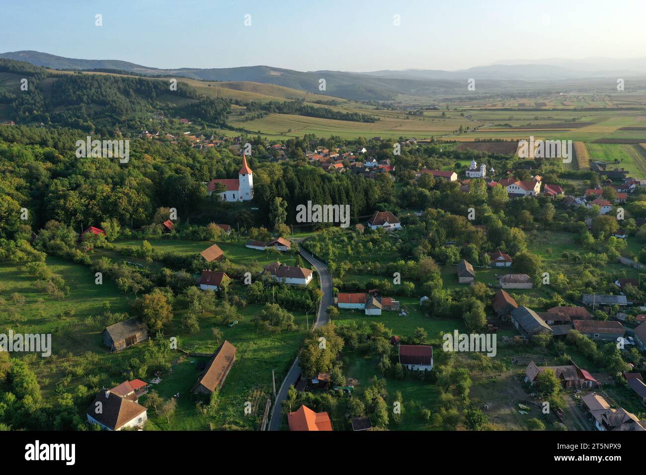 Aerial view of a small village by drone. Bikfalva, Bicfalau ...